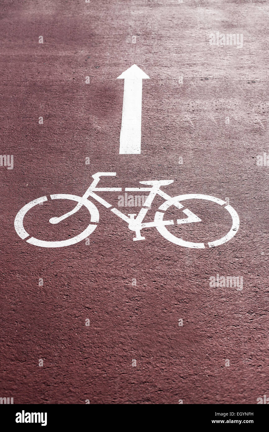 Bicycle lane sign with arrow Stock Photo - Alamy