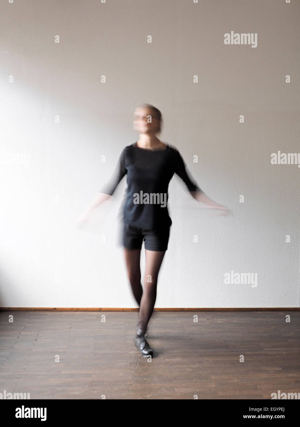 Young woman step dancing Stock Photo - Alamy