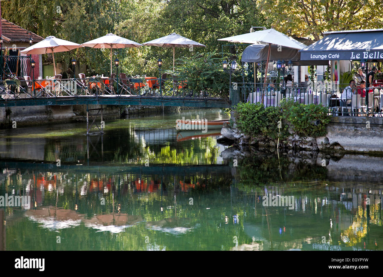The Sorgue River runs through the town of L'Isle-sur-la-Sorgue ...