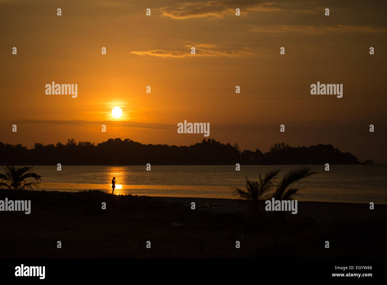 Sunset on an Island Stock Photo - Alamy