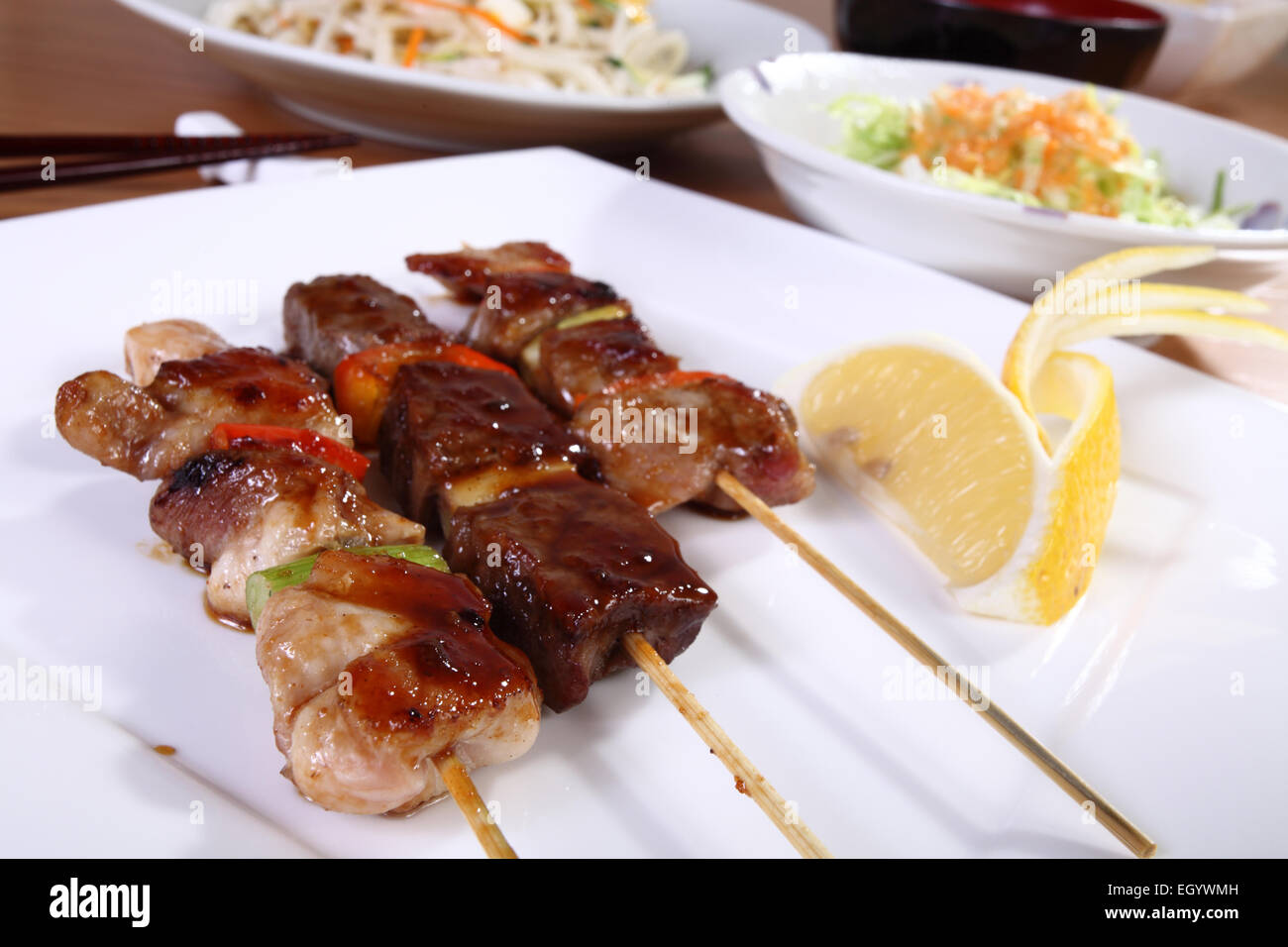 Japanese menu of fish and salad Stock Photo - Alamy