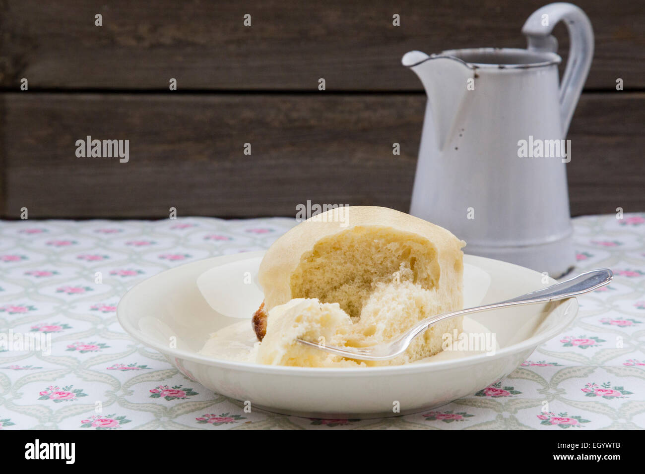 Yeast dumpling with vanilla sauce Stock Photo - Alamy