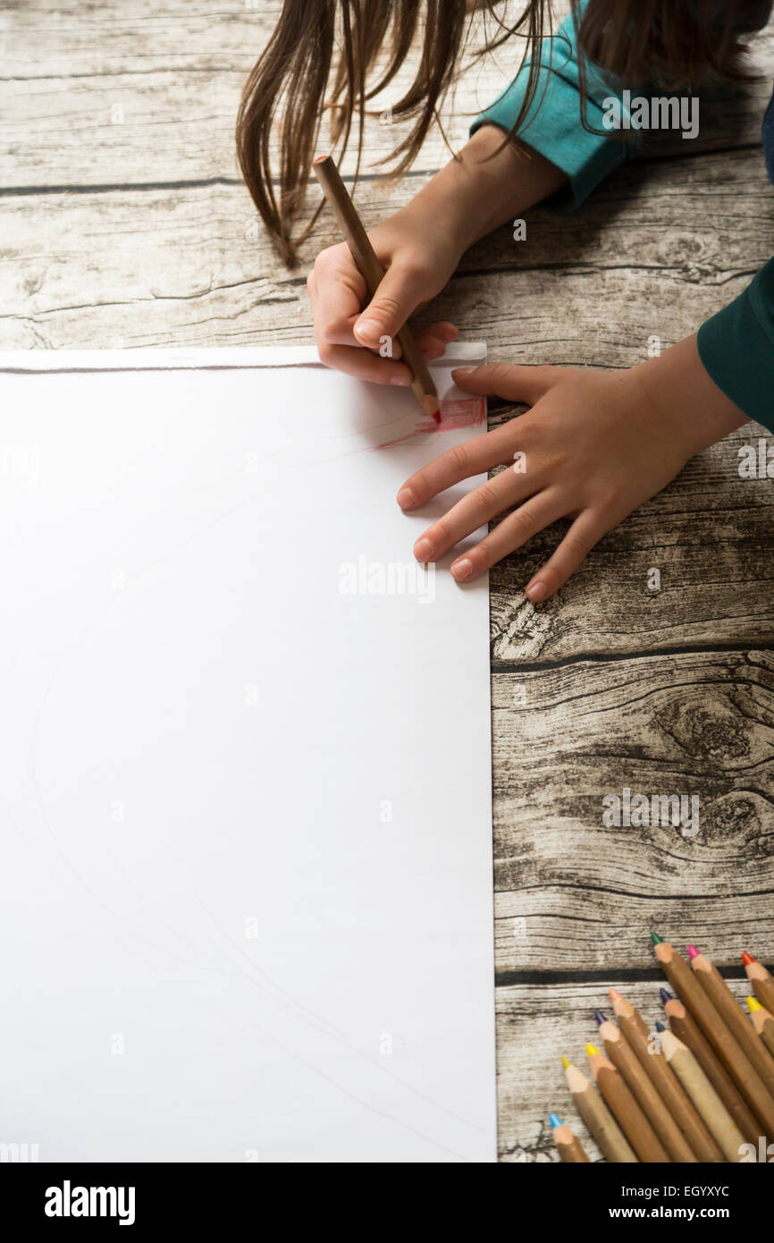 Girl's hands drawing Stock Photo - Alamy