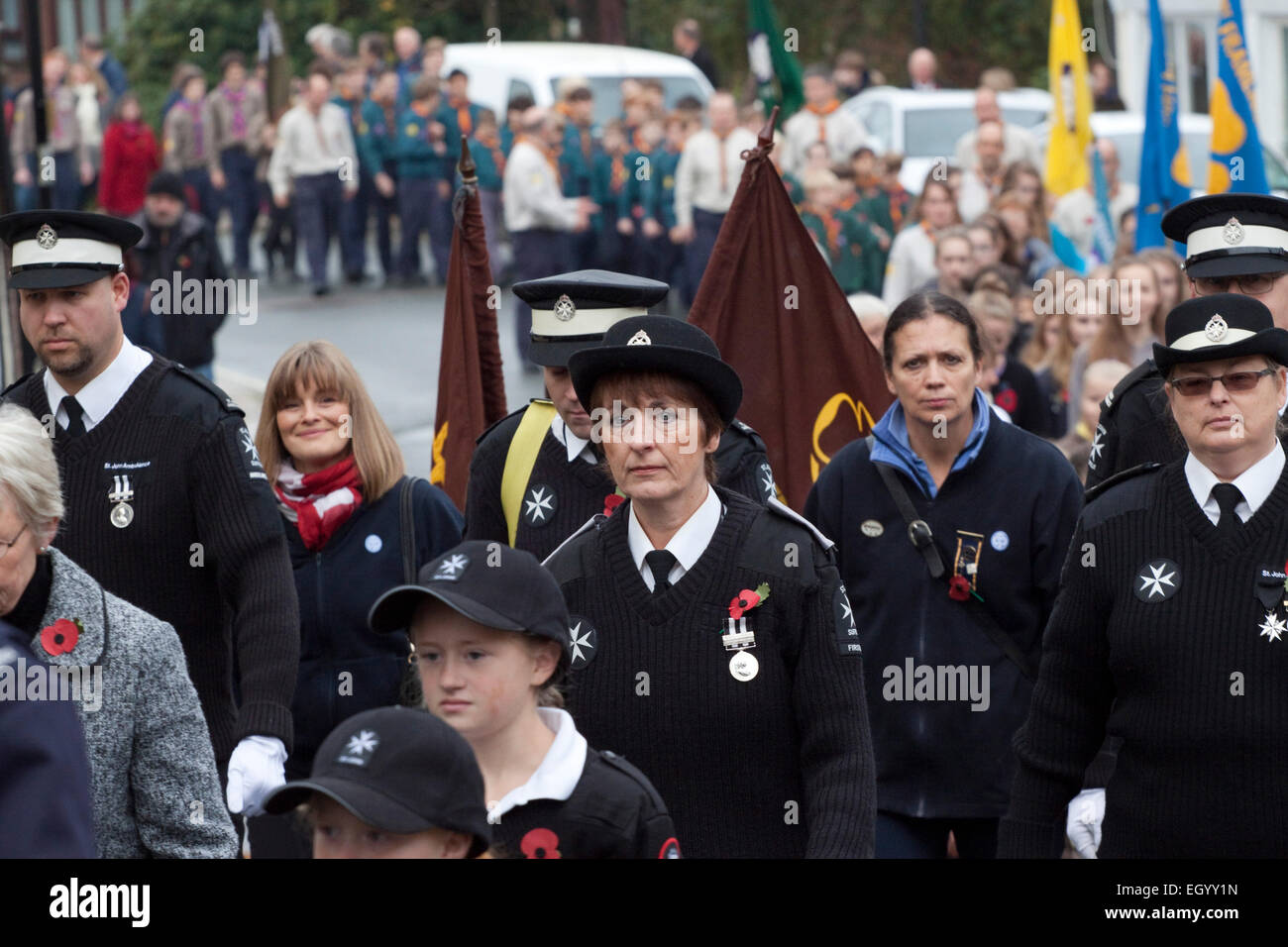 St John Ambulance volunteers in uniform marching in a Remembrance ...