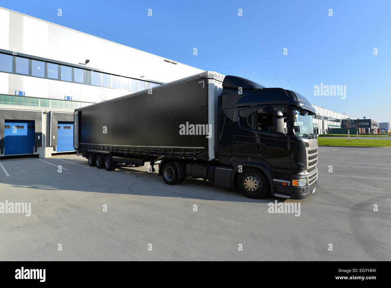 Truck at a loading bay Stock Photo - Alamy