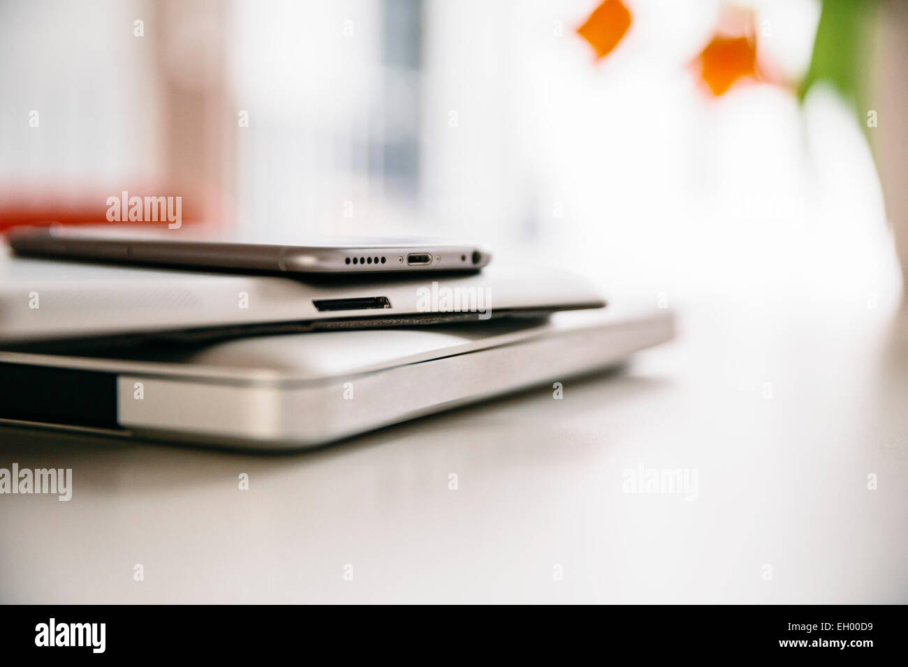Stack of mobile devices with jacks Stock Photo - Alamy