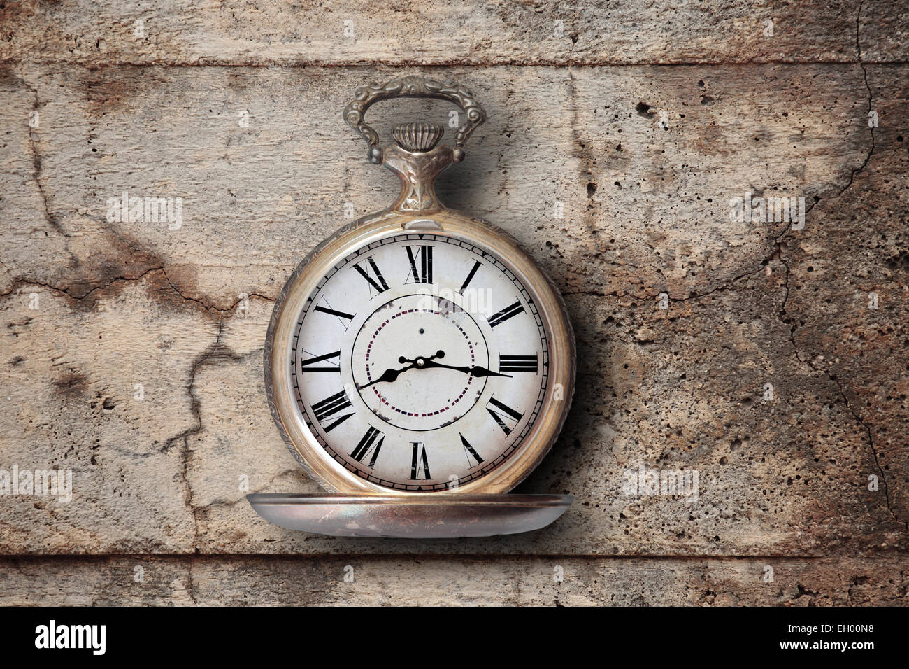 old and vintage clock on an old wall Stock Photo - Alamy