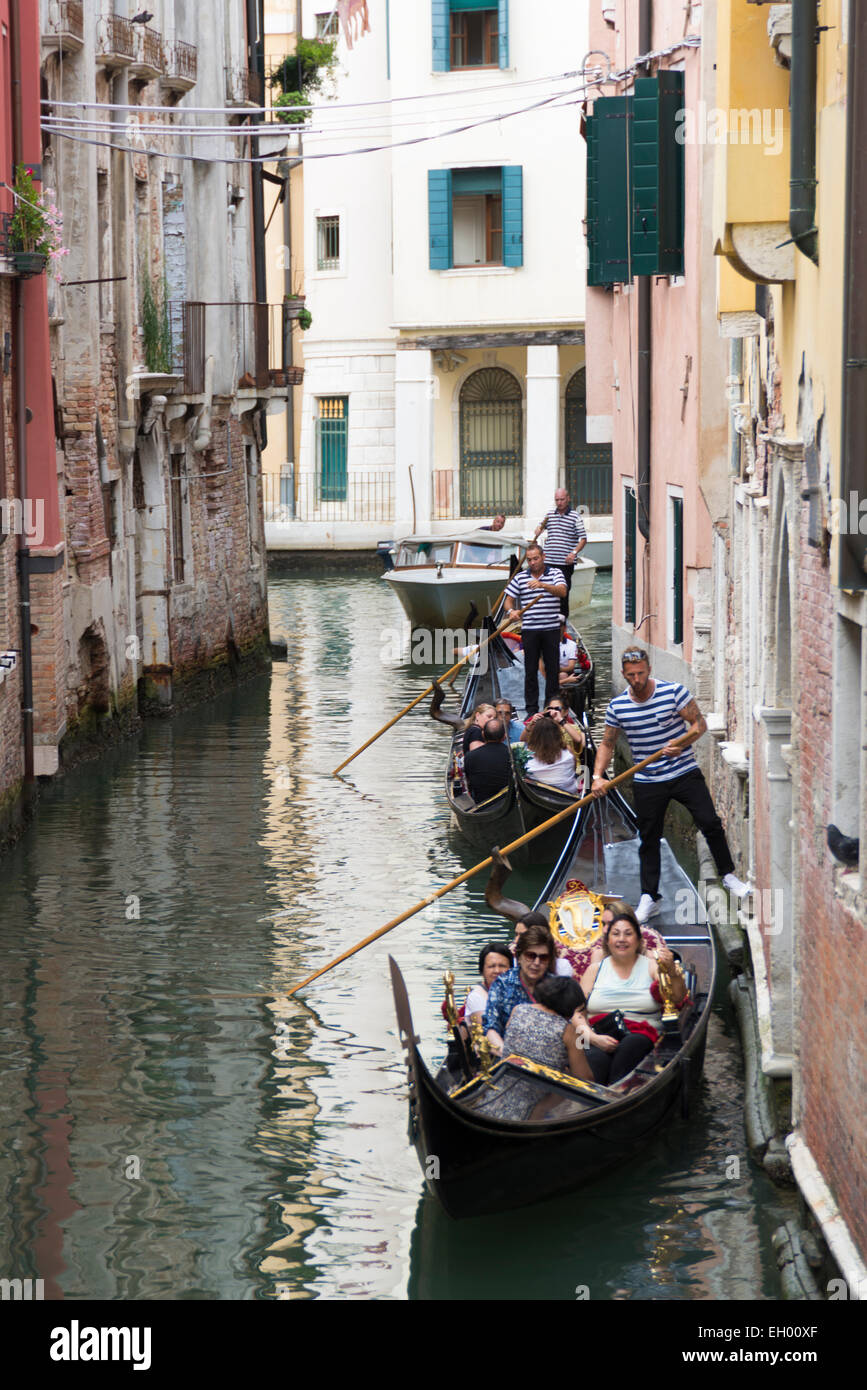A traditional Gondola boat ride in Venice canal Stock Photo - Alamy