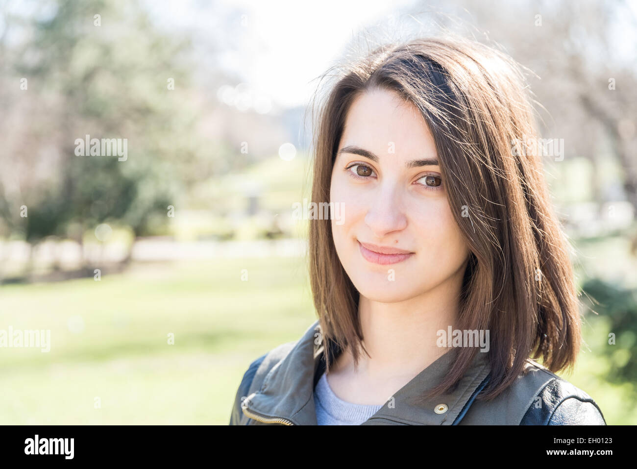 Beautiful Smiling Girl Portrait In Autumn Park Stock Photo - Alamy