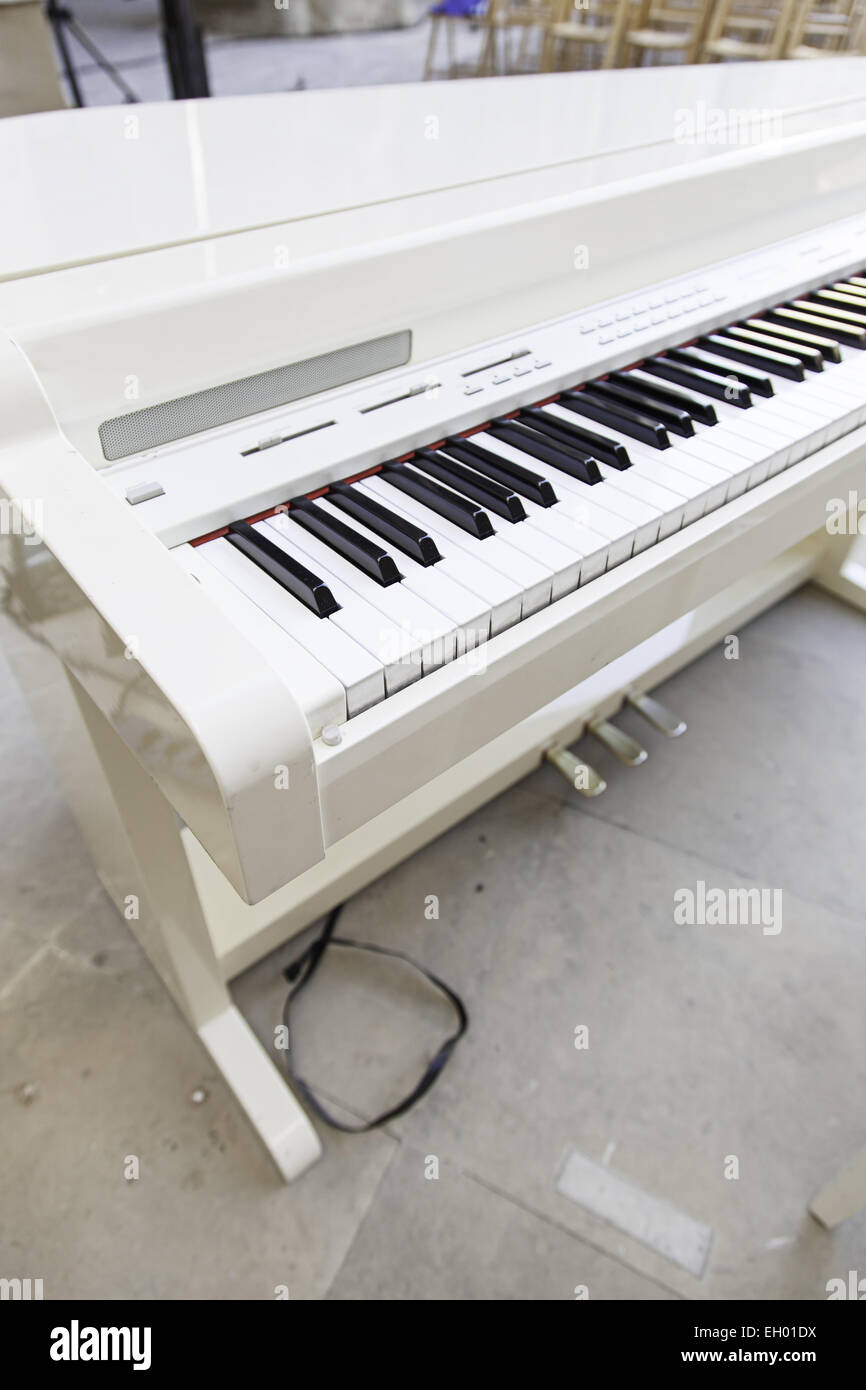 White piano on stage, detail musial instrument of classical music Stock ...