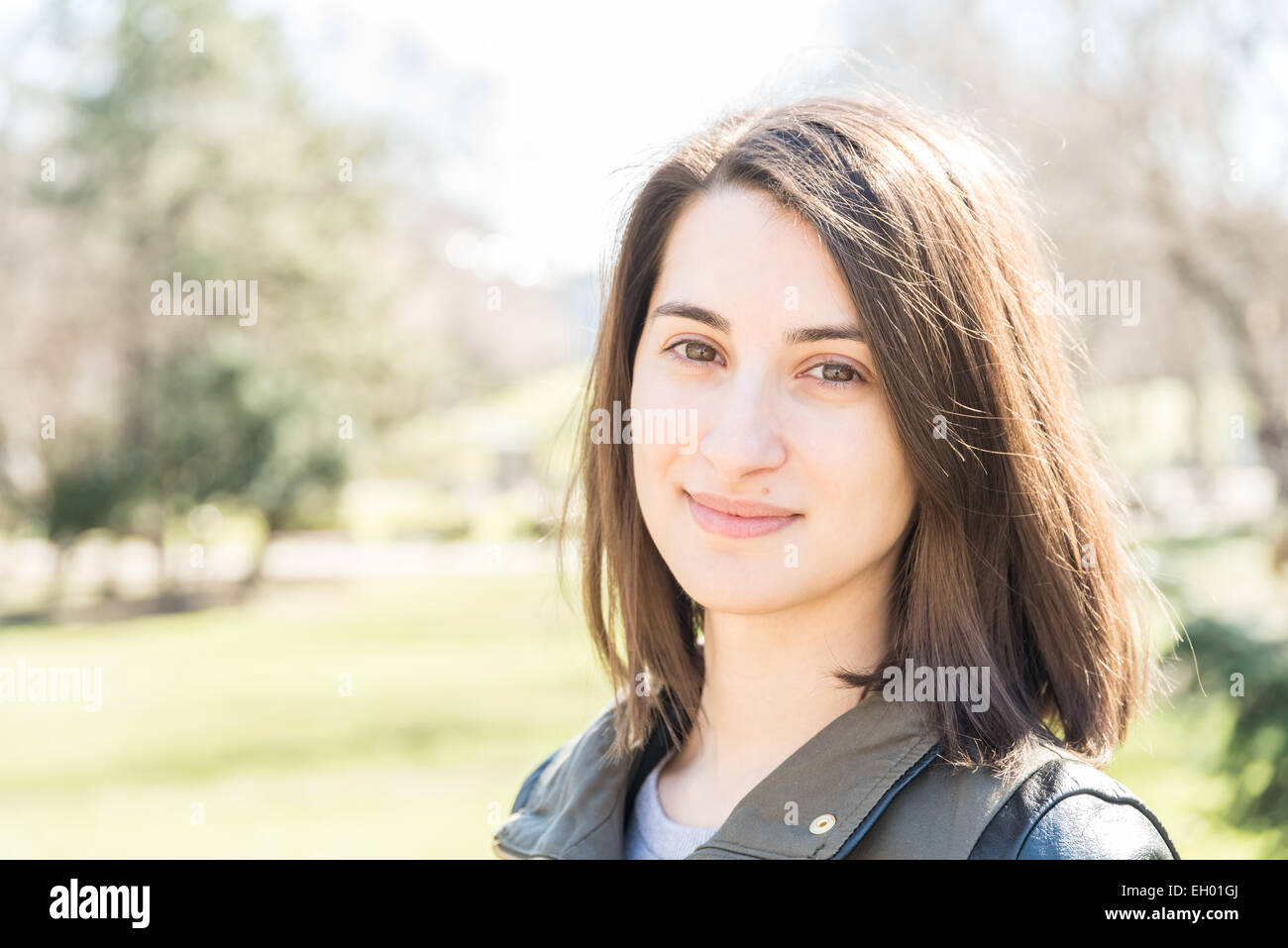 Beautiful Smiling Girl Portrait In Autumn Park Stock Photo - Alamy