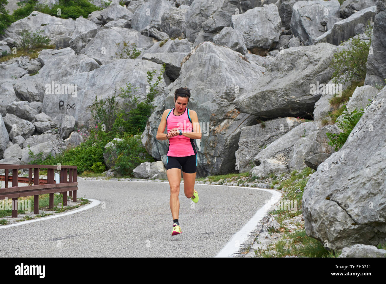 Woman running near lake garda hi-res stock photography and images - Alamy