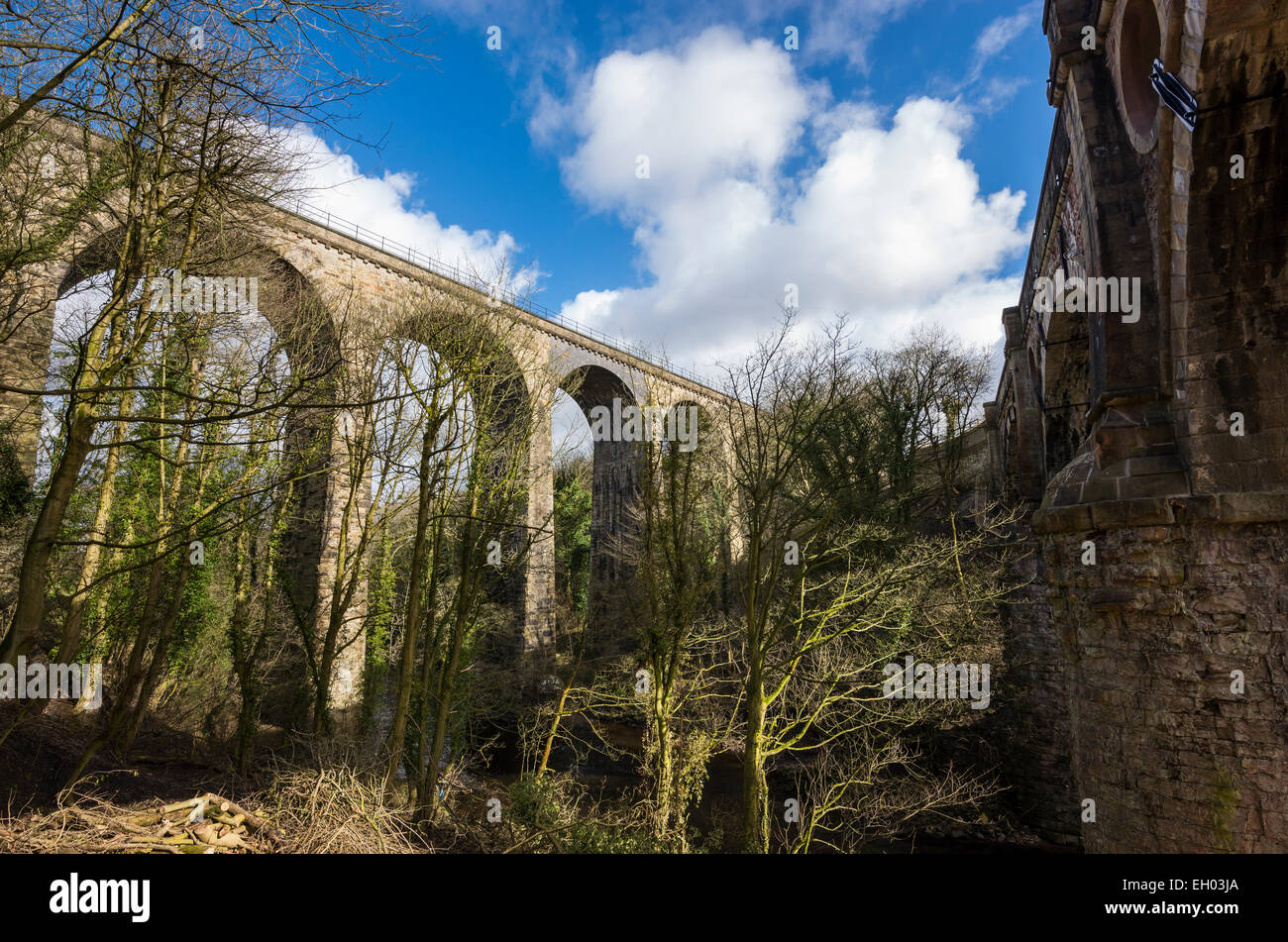 Two bridges at Marple in Greater Manchester. Railway bridge to the left ...