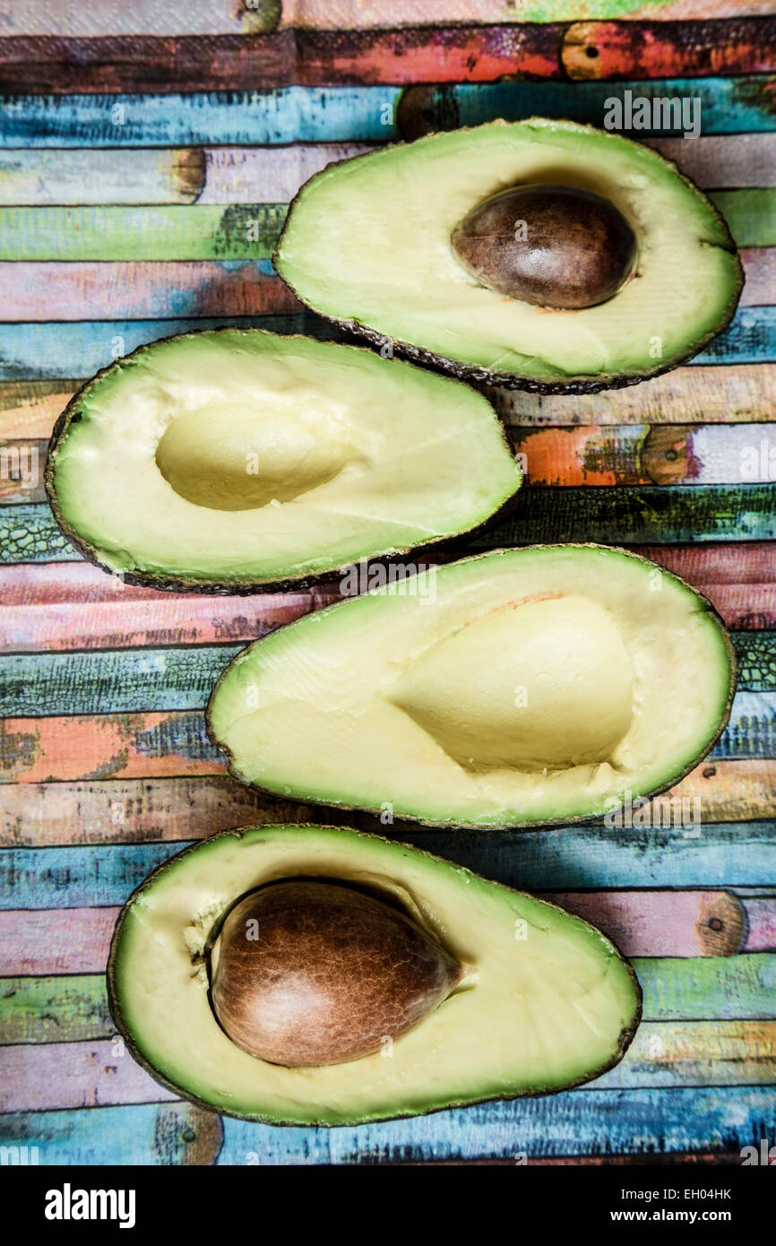 Avocado and half avocado with kernels hi-res stock photography and ...