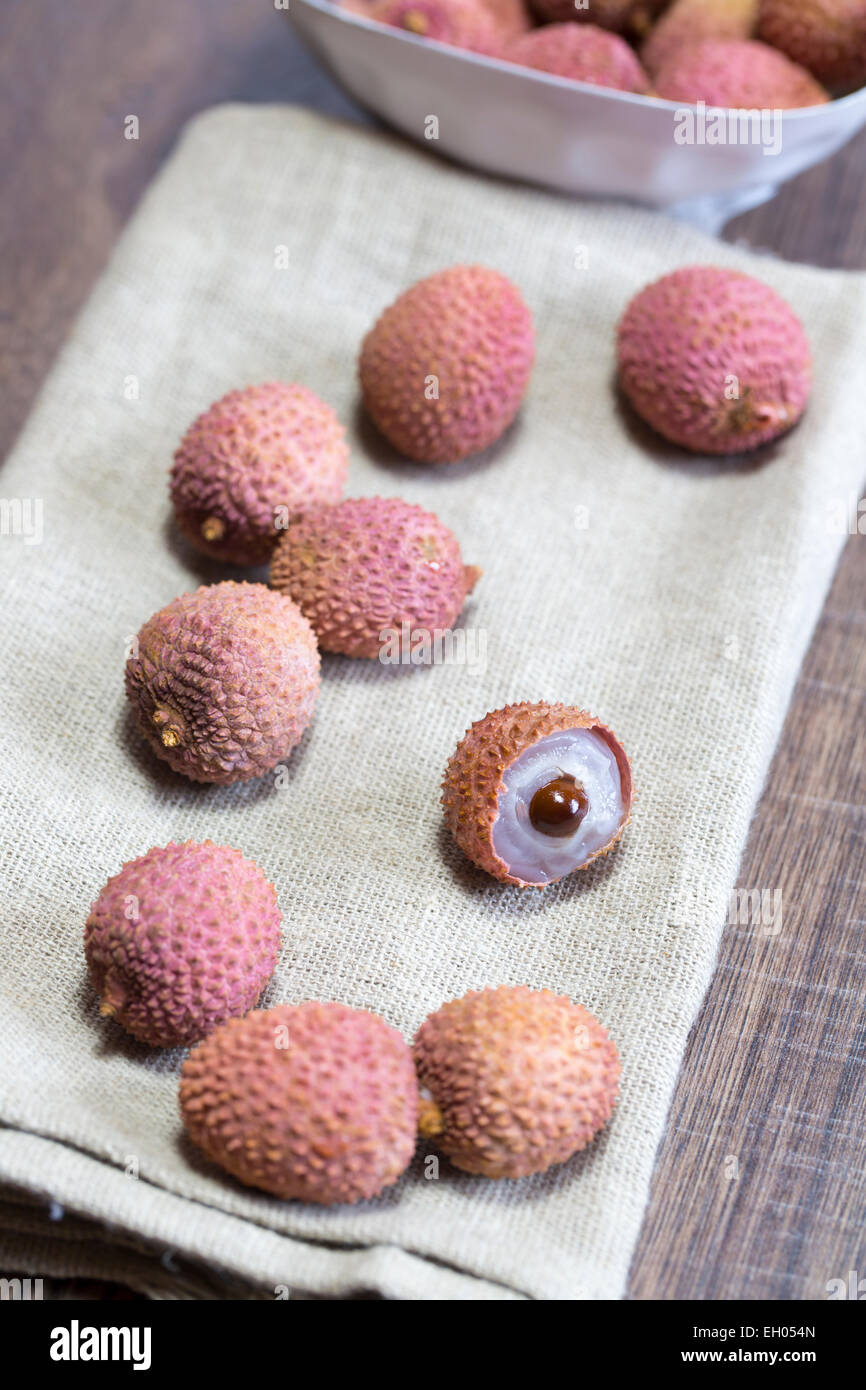 Lychees on white cloth Stock Photo - Alamy