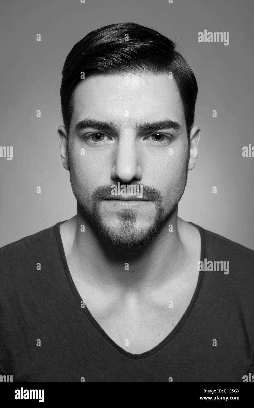 Portrait of serious looking man Stock Photo - Alamy