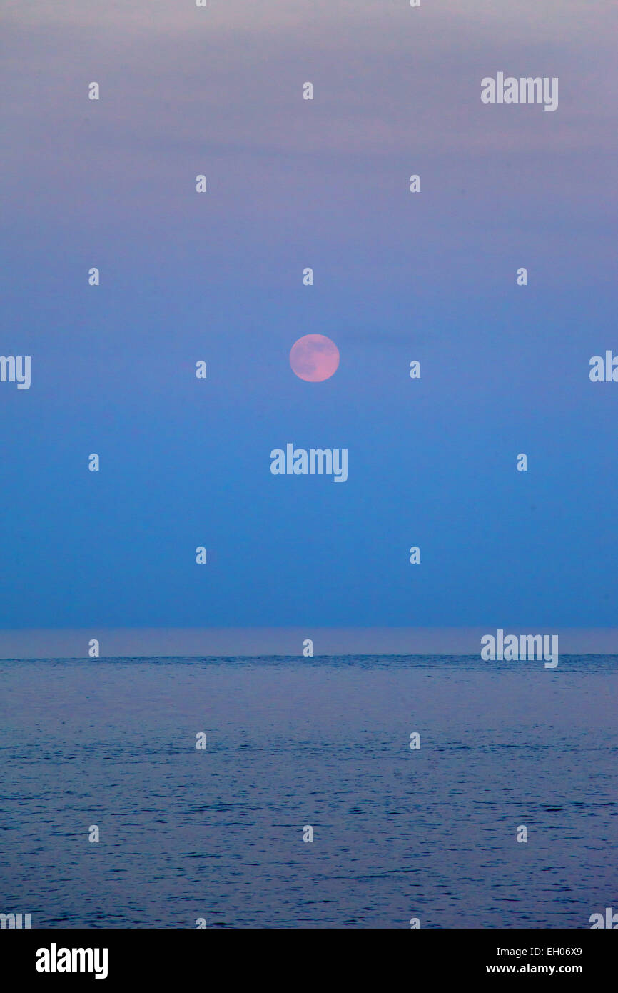 Moonrise on sea Stock Photo - Alamy