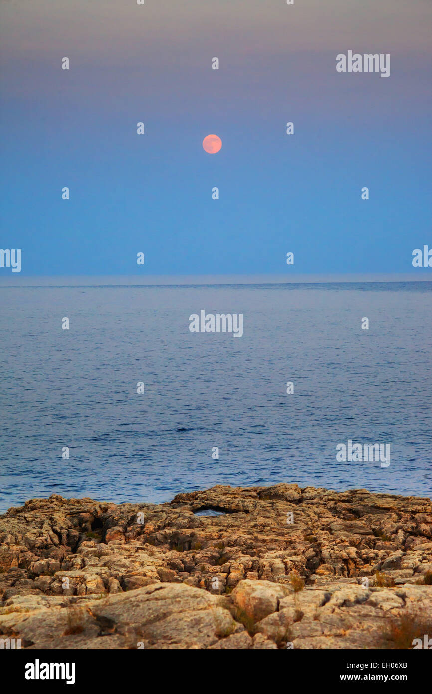 Moonrise on sea Stock Photo - Alamy