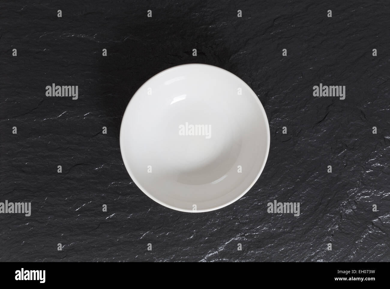 Empty shell on slate in bird's eye view Stock Photo - Alamy