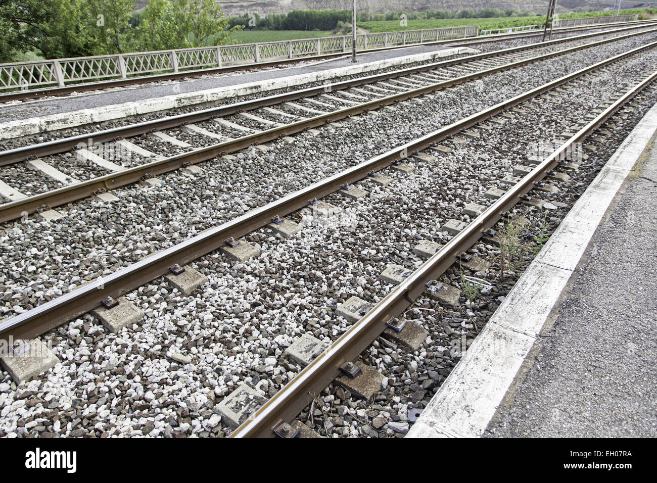Railroad tracks, roads in some detail a station, overland transport ...