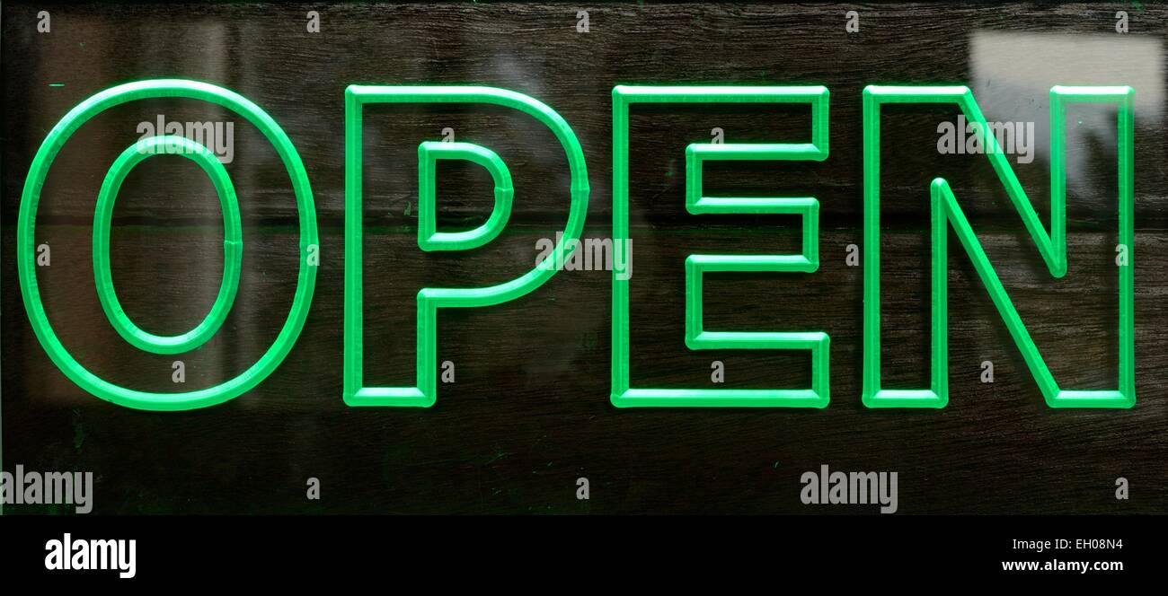 LED open sign hang on wood wall Stock Photo - Alamy