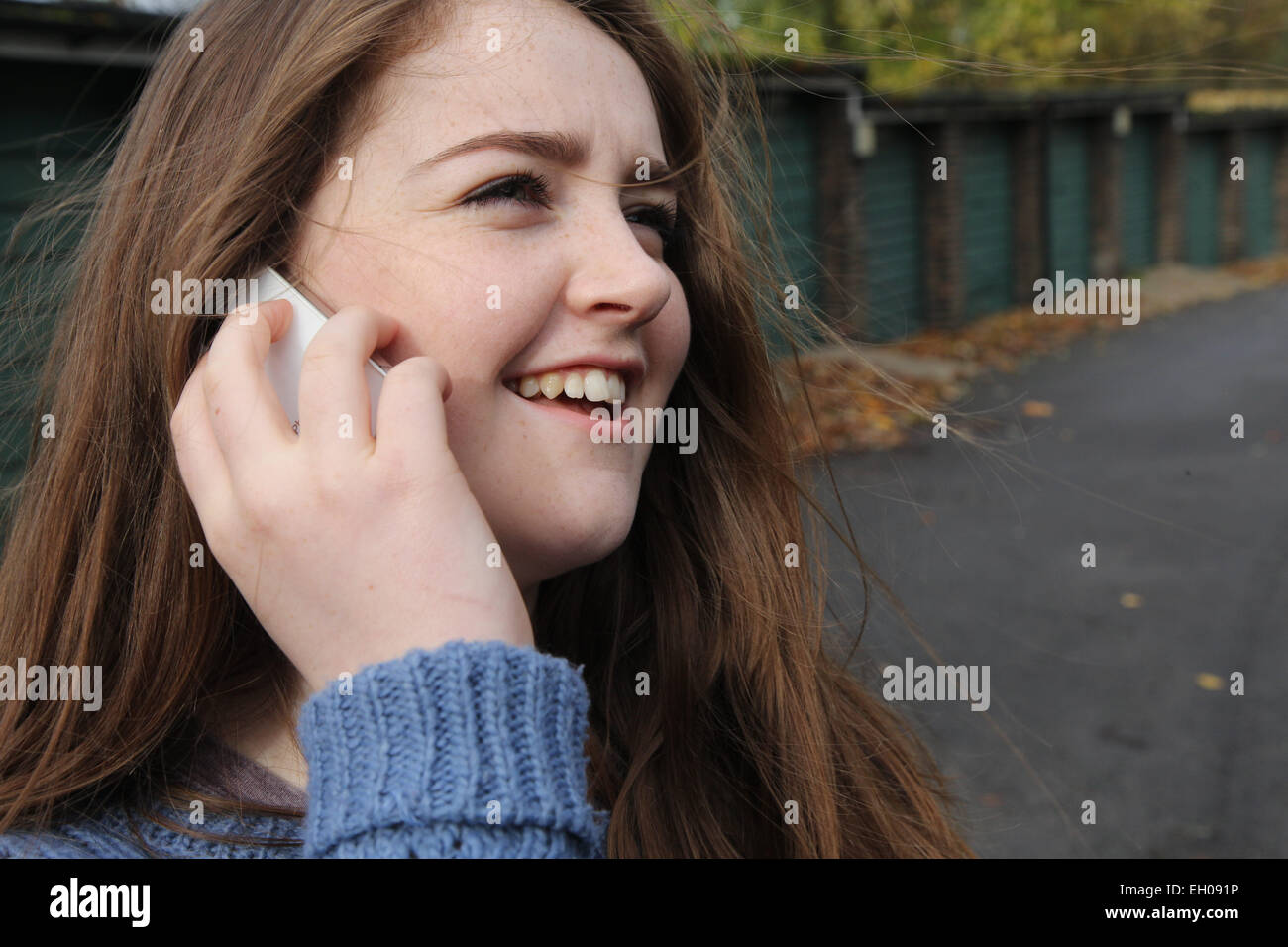 Teenage girl talking on mobile phone - model released Stock Photo - Alamy
