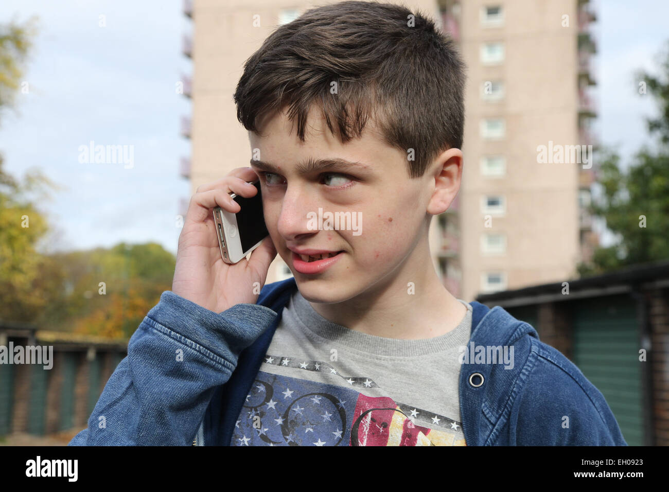 Boy talking on mobile hi-res stock photography and images - Alamy