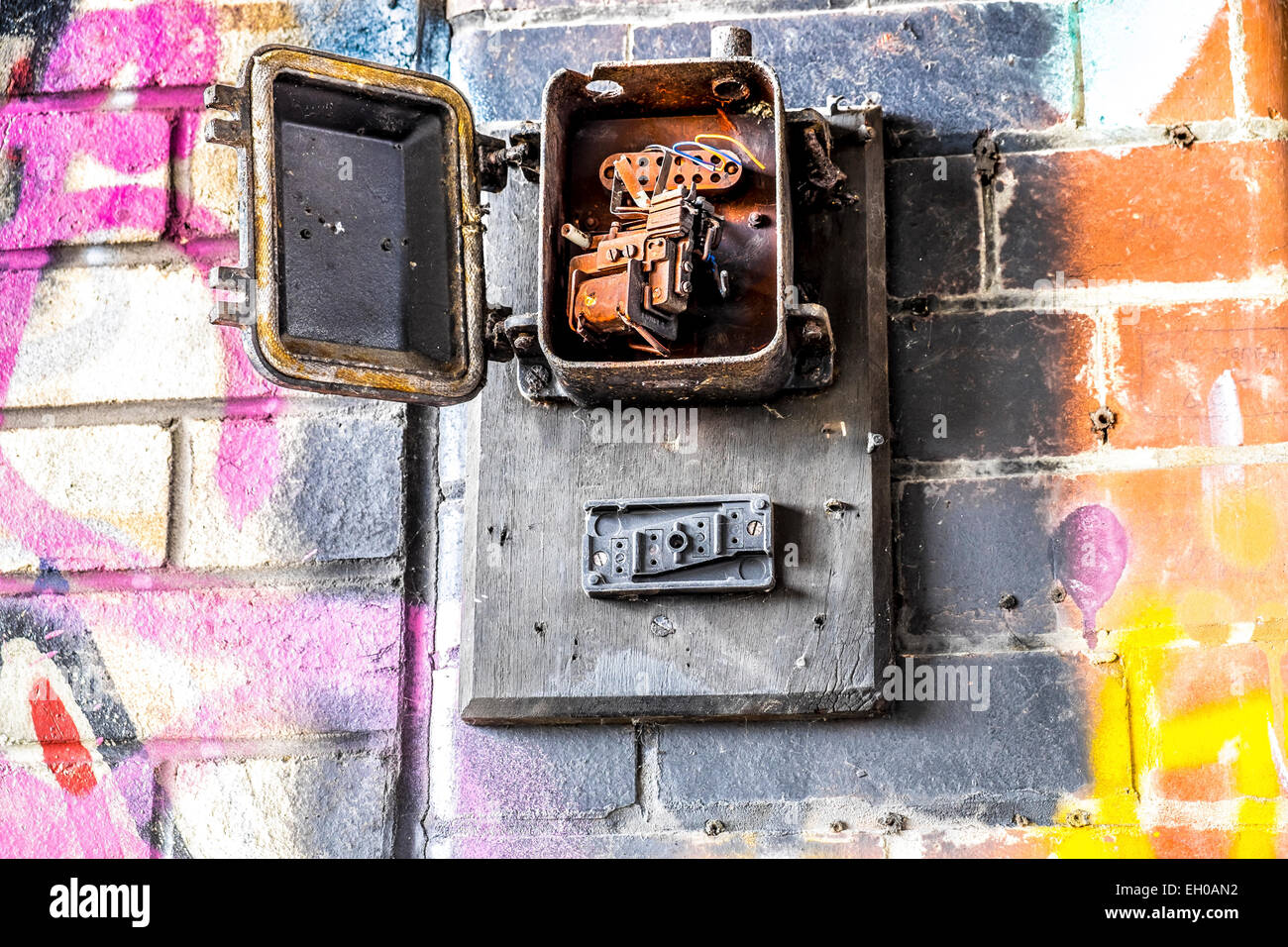 Disused and derelict power station with graffiti on all walls and ...