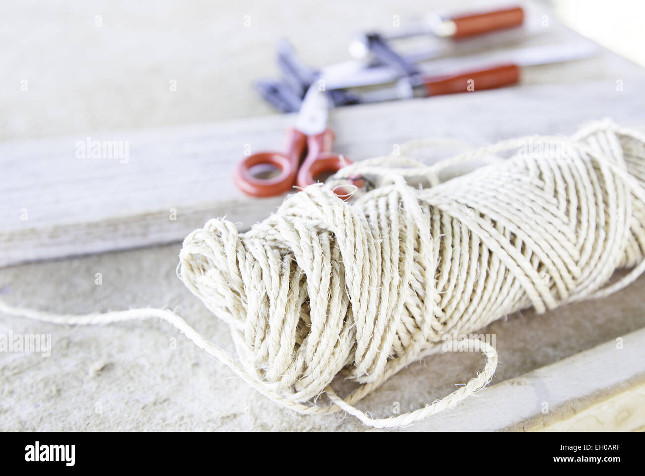 String and scissors to cut, detail of some tools, crafts Stock Photo ...