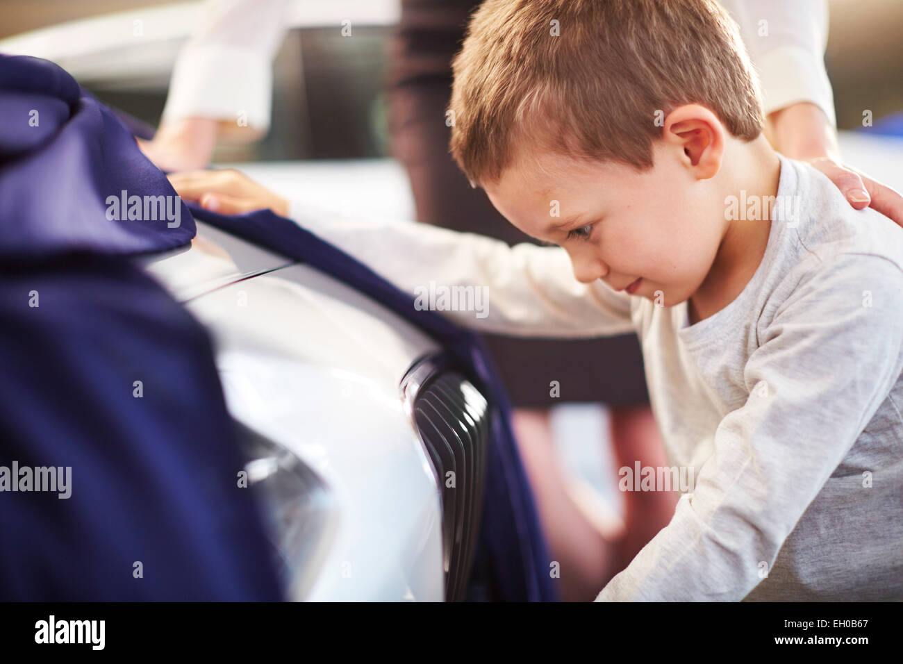 New car unveiling cover hi-res stock photography and images - Alamy