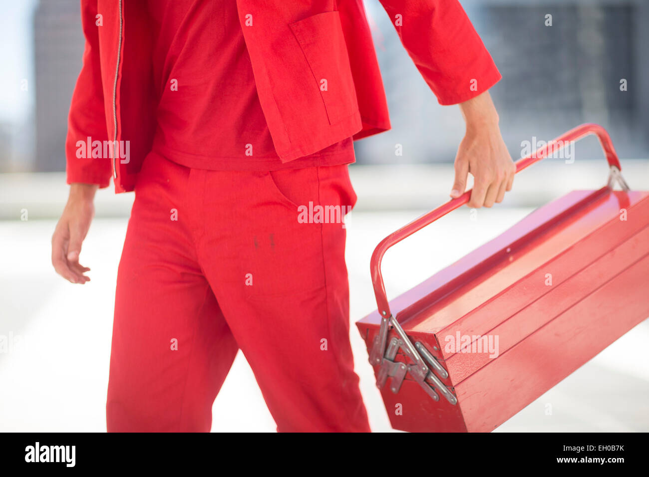 Man carrying tool box on hi-res stock photography and images - Alamy