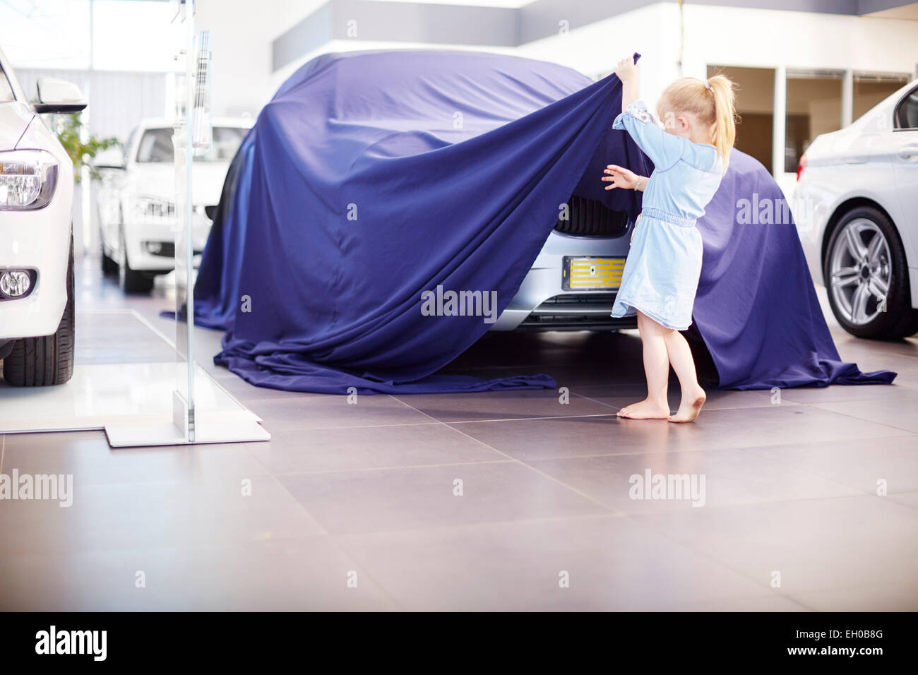 New car unveiling cover hi-res stock photography and images - Alamy