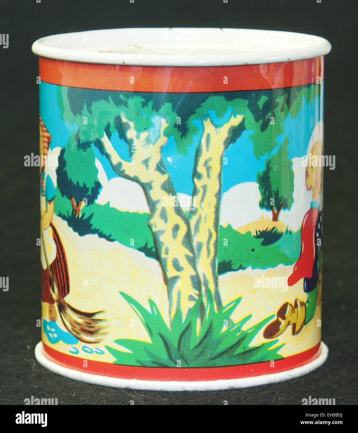 A tin piggy bank featuring images from fairy tales. The design is often ...