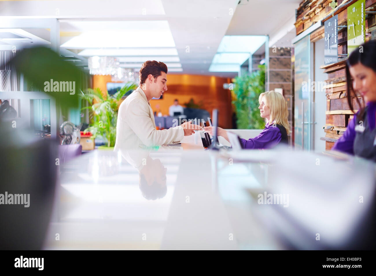 Arriving at reception hi-res stock photography and images - Alamy