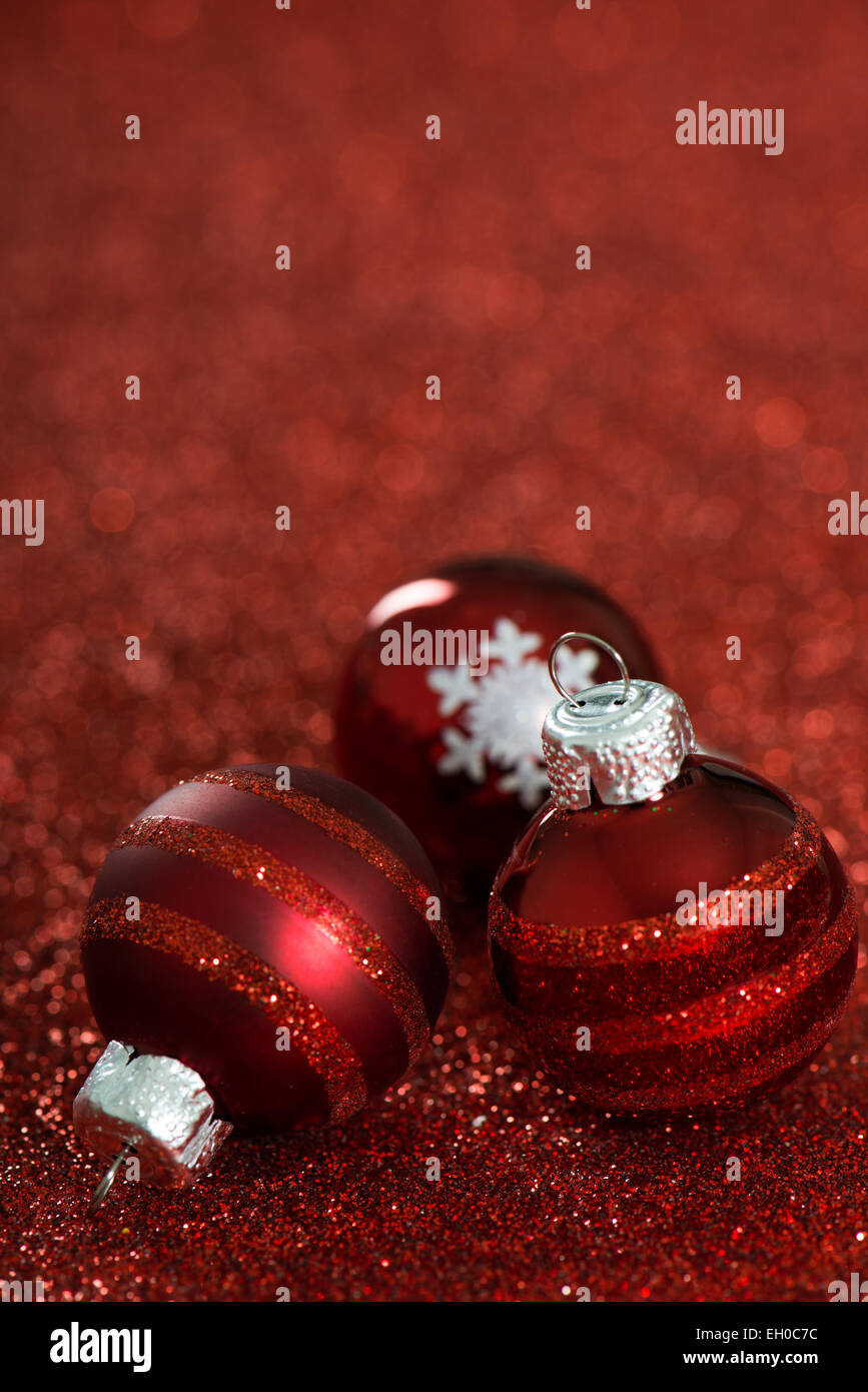 Red christmas balls on red background Stock Photo - Alamy