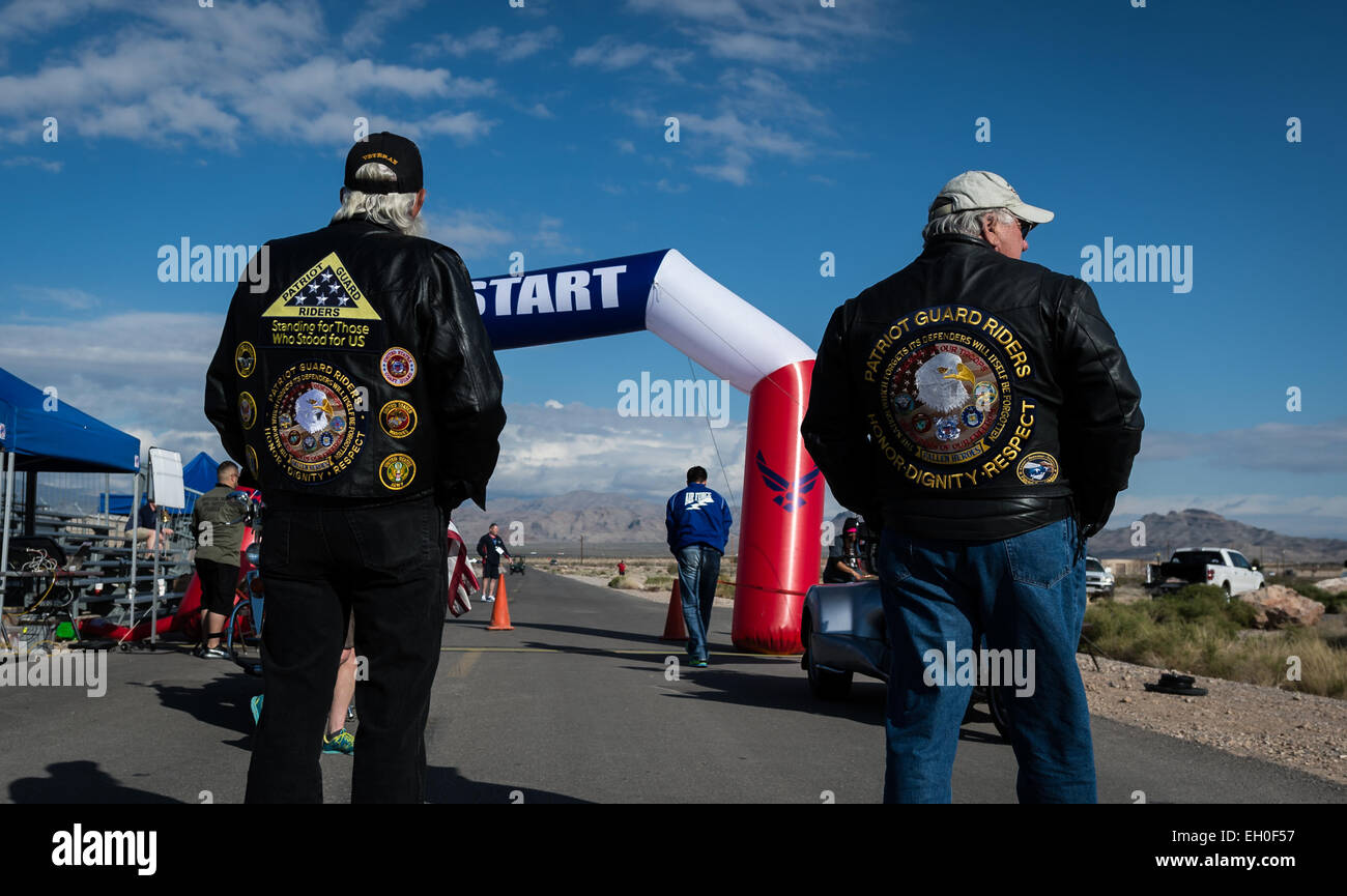 Two Nevada Patriot Guard Riders stand by the starting line to the ...