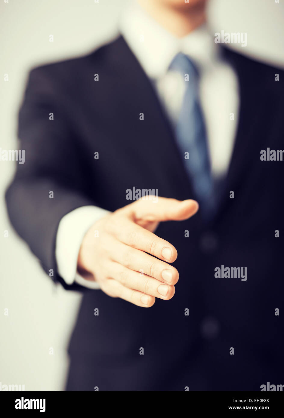 businessman with open hand Stock Photo - Alamy