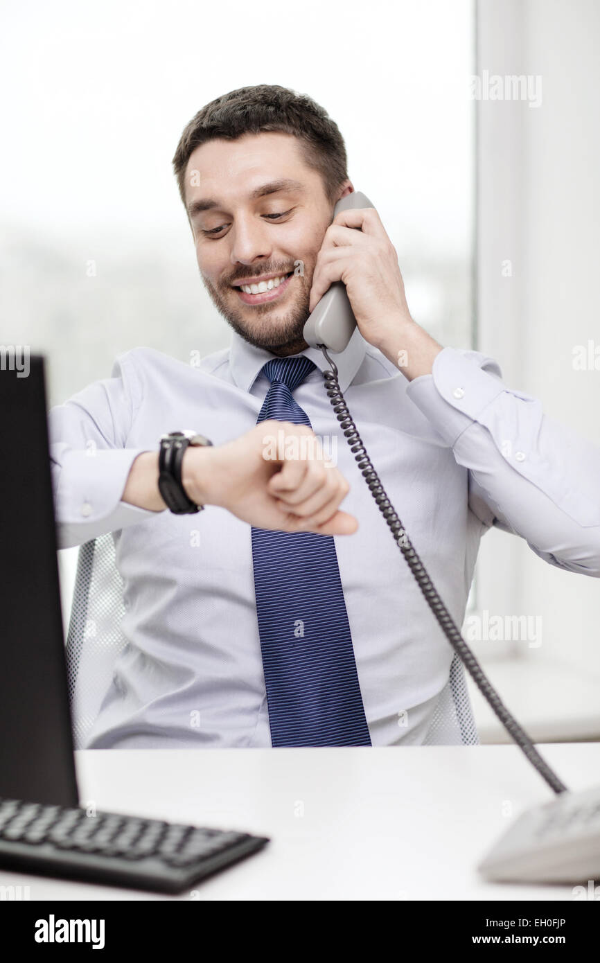 smiling businessman making call Stock Photo - Alamy