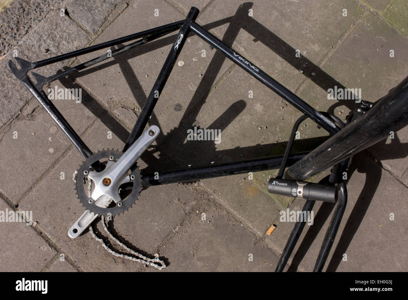 Vandalised and stripped bike frame lying on a central London street ...