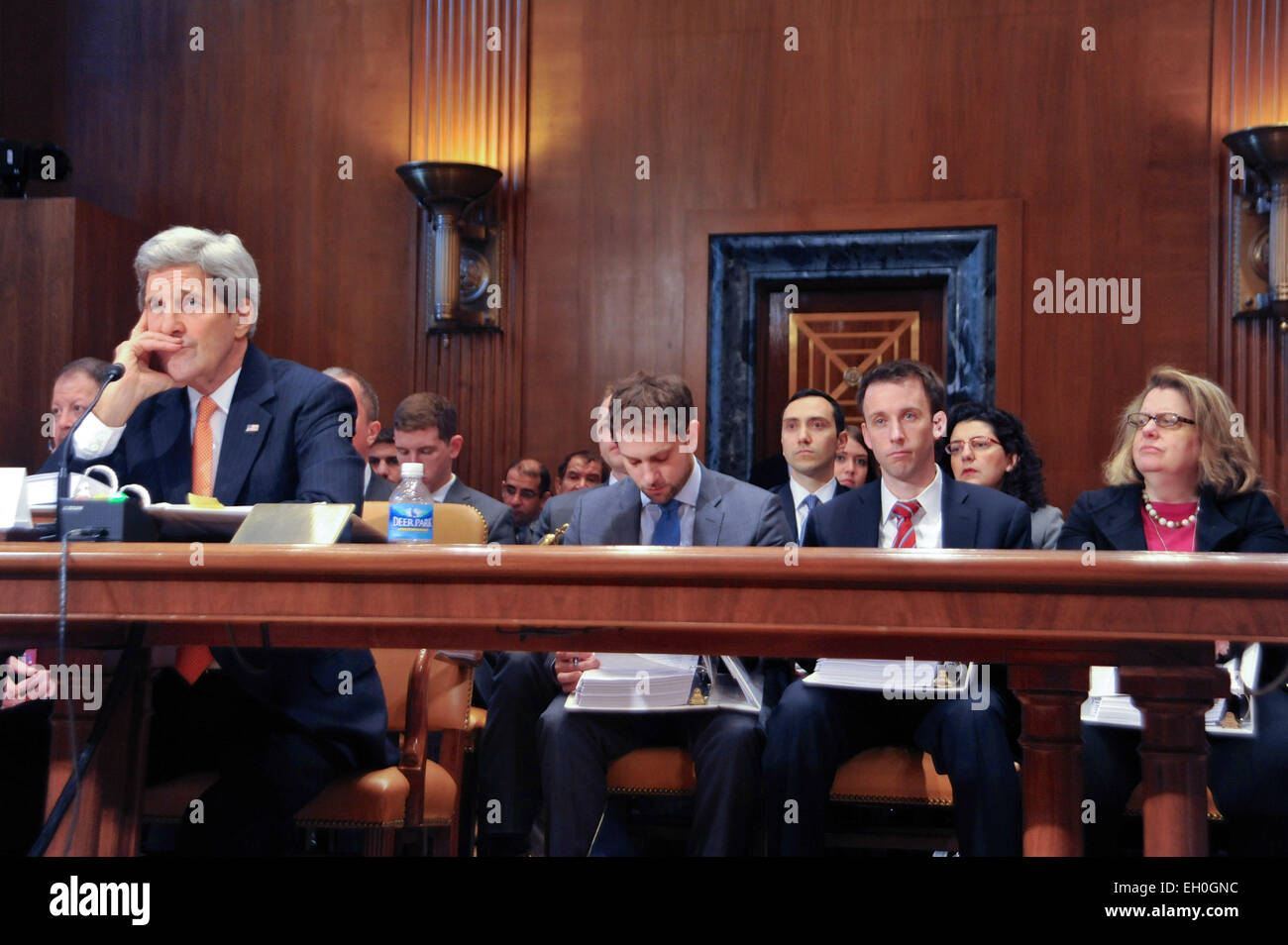 U.S. Secretary of State John Kerry, flanked by Deputy Chief of Staff ...