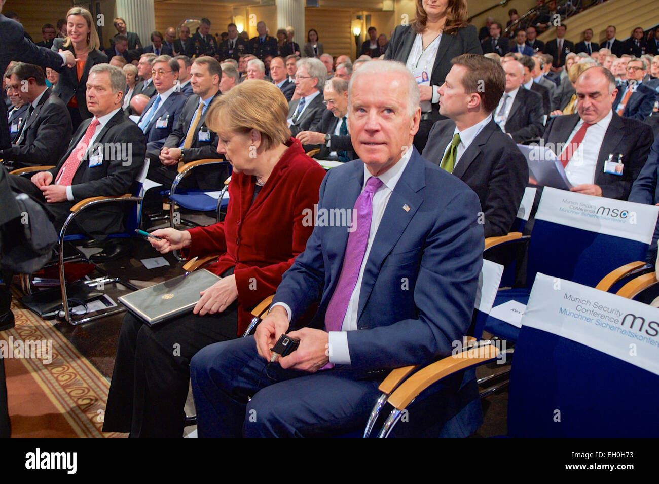 Vice President Joe Biden sits with German Chancellor Angela Merkel ...