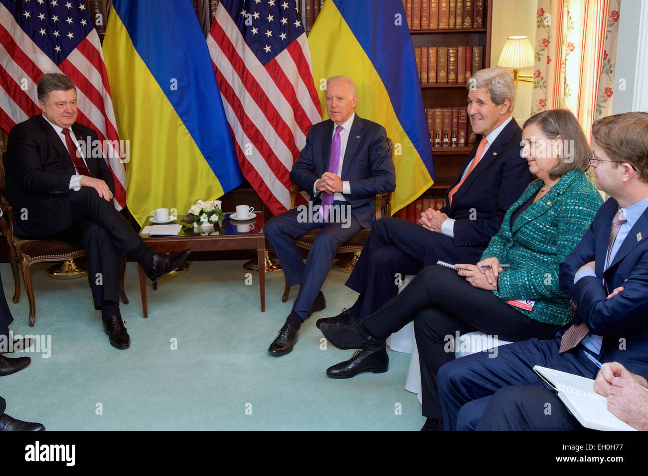 Vice President Joe Biden, flanked by U.S. Secretary of State John Kerry ...