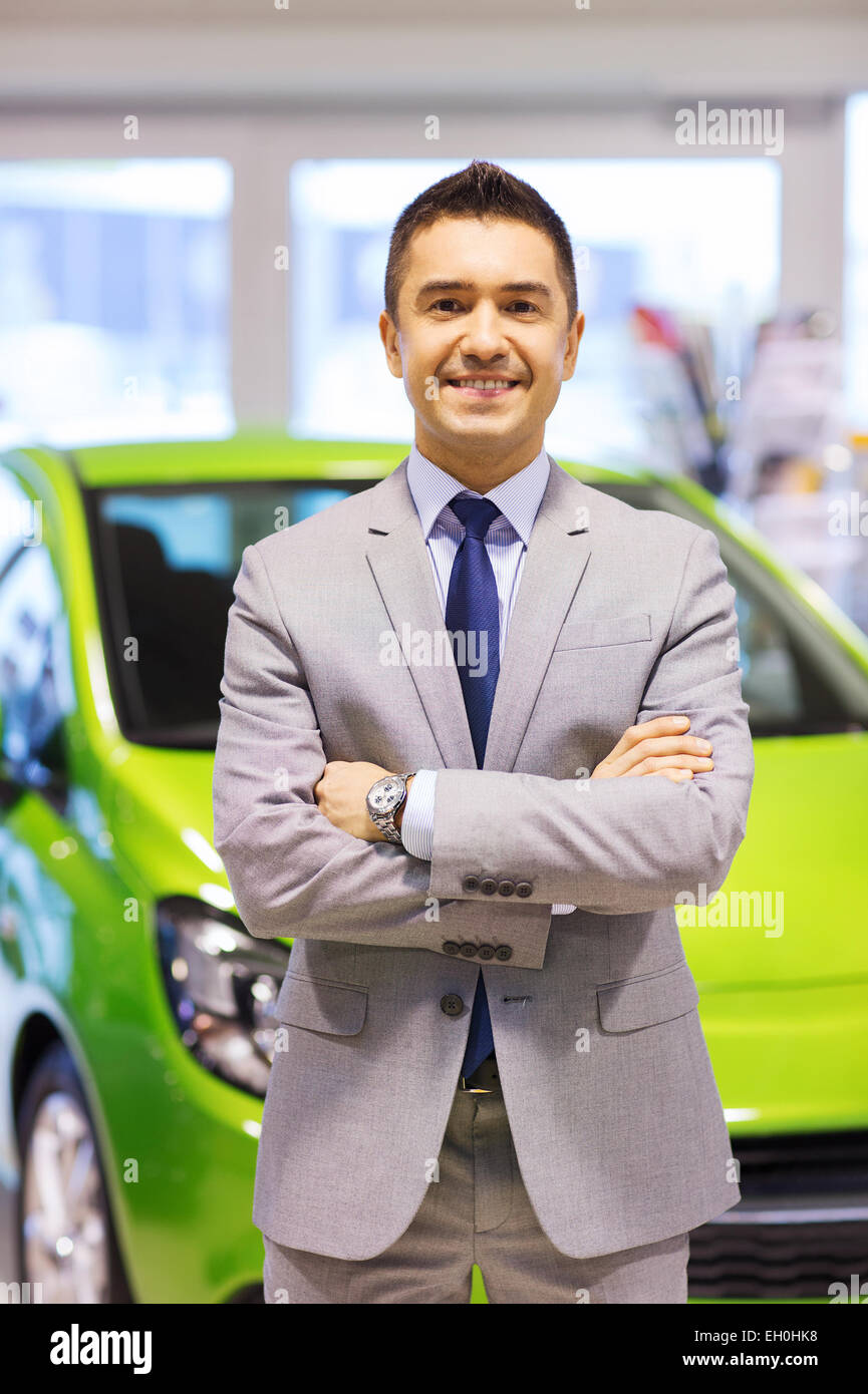 happy man at auto show or car salon Stock Photo - Alamy