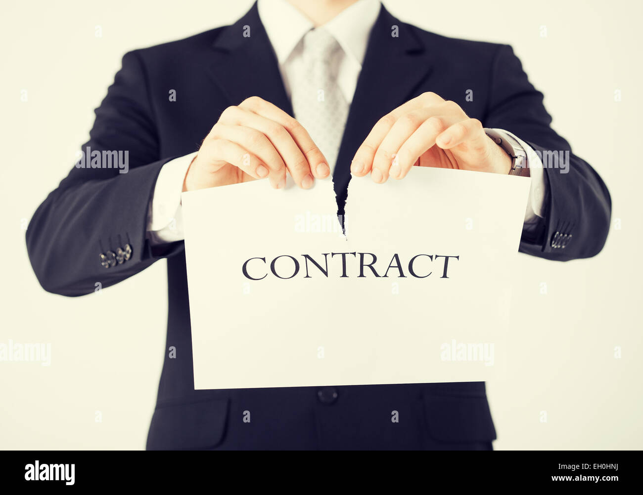 man hands tearing contract paper Stock Photo - Alamy