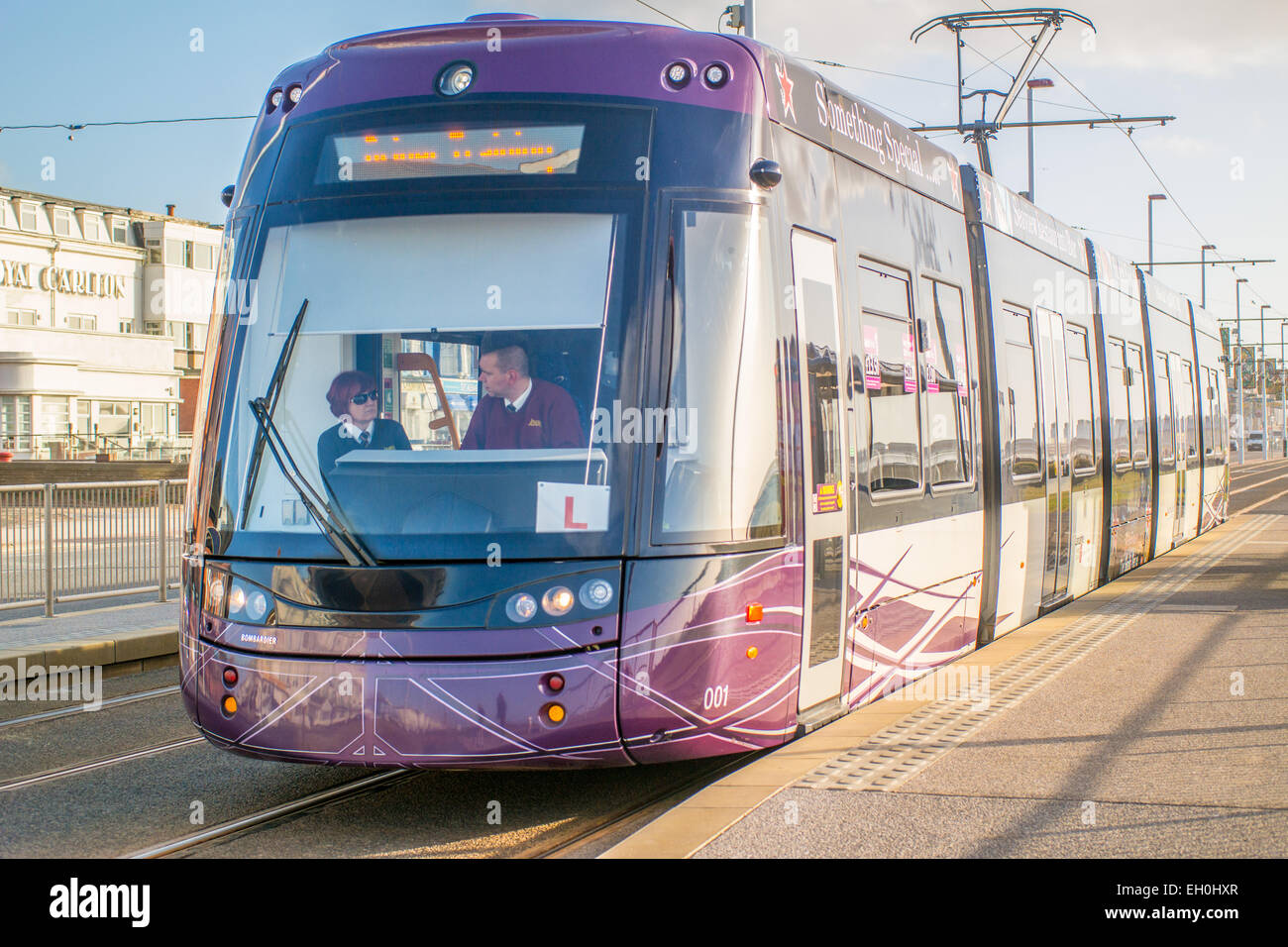 Tram driver learning to operate one of the resorts new trams Stock ...