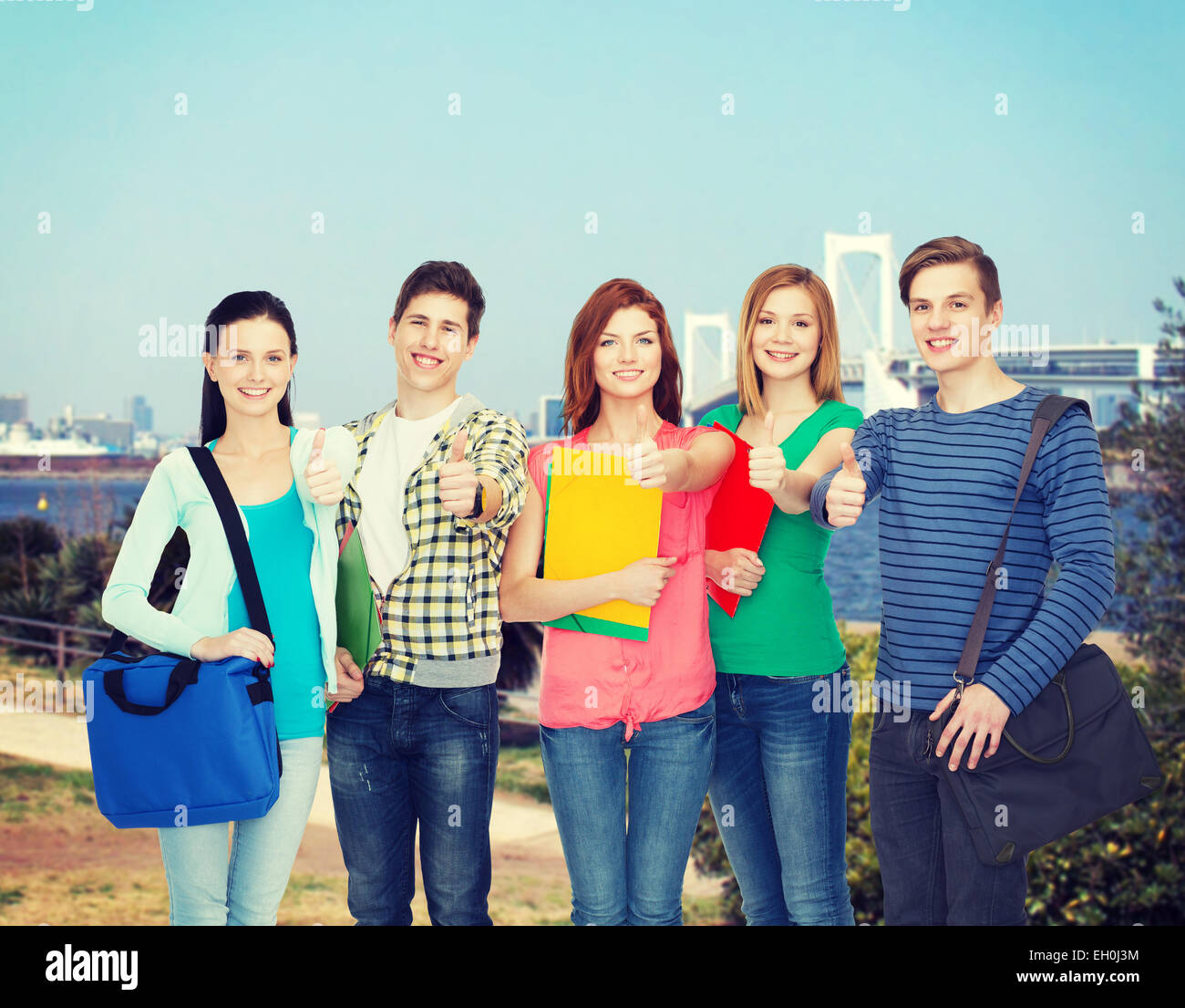 group of smiling students standing Stock Photo - Alamy