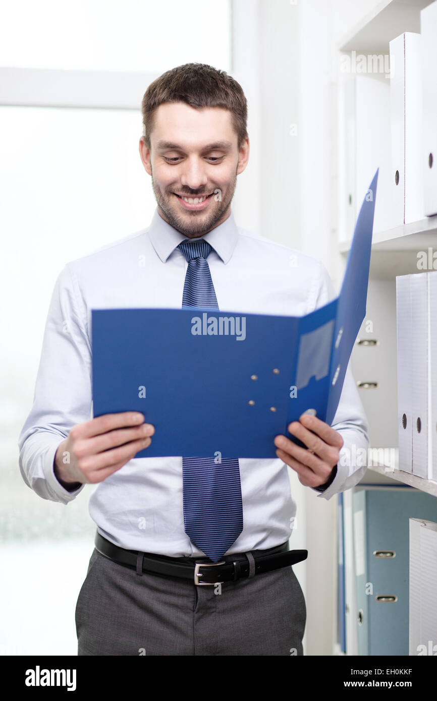 businessman with folder at office Stock Photo - Alamy