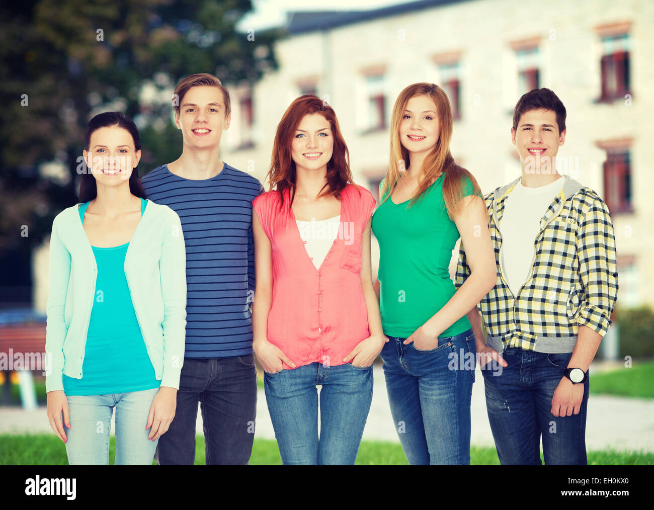 group of smiling students standing Stock Photo - Alamy