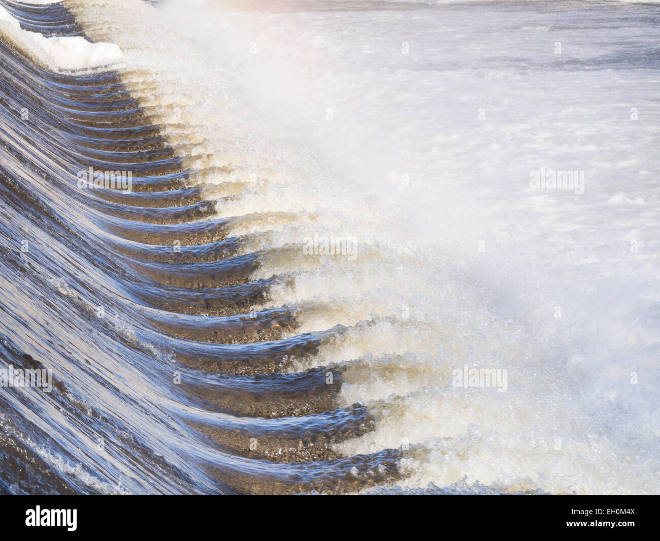 snow on river with dam Stock Photo - Alamy