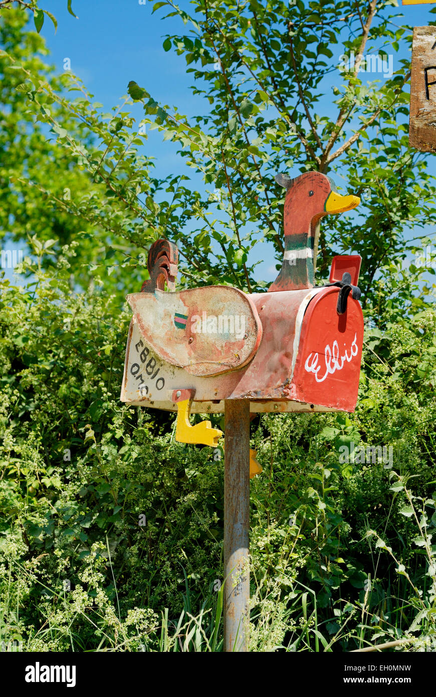Rusty old rural mailbox with duck design Stock Photo - Alamy